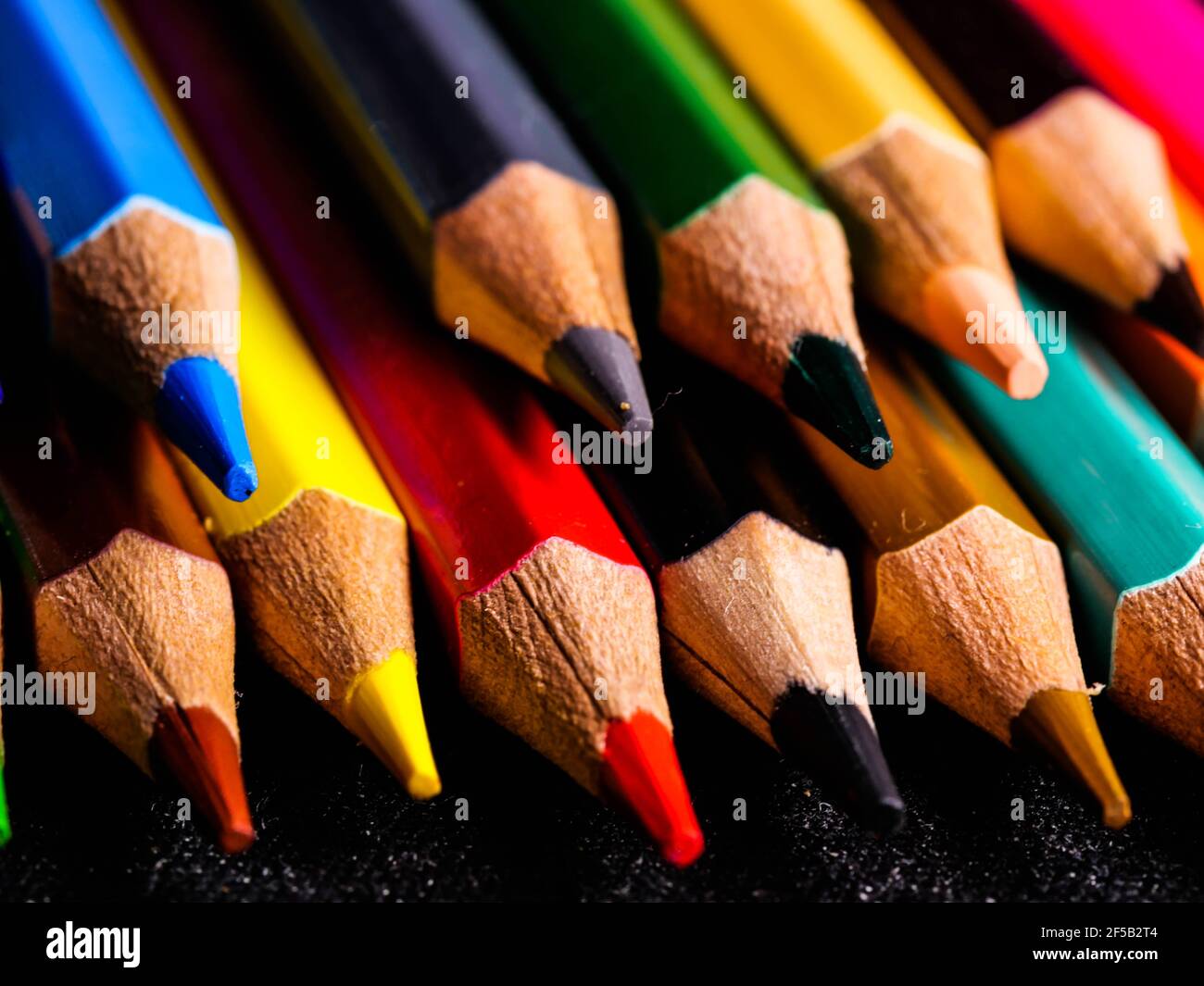 Colored pencils background Stock Photo - Alamy