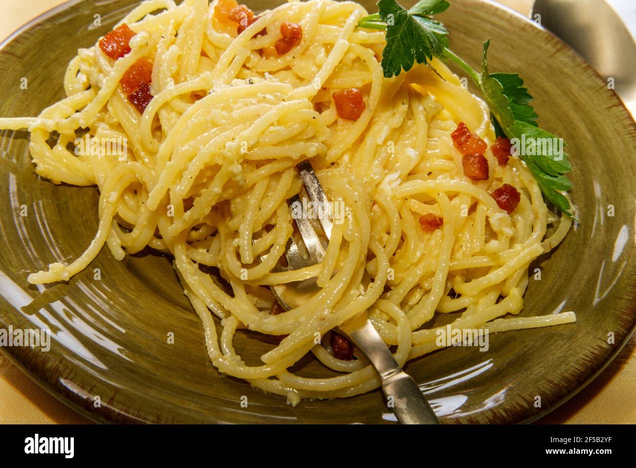 Creamy Italian cuisine spaghetti alla carbonara with pancetta and ...