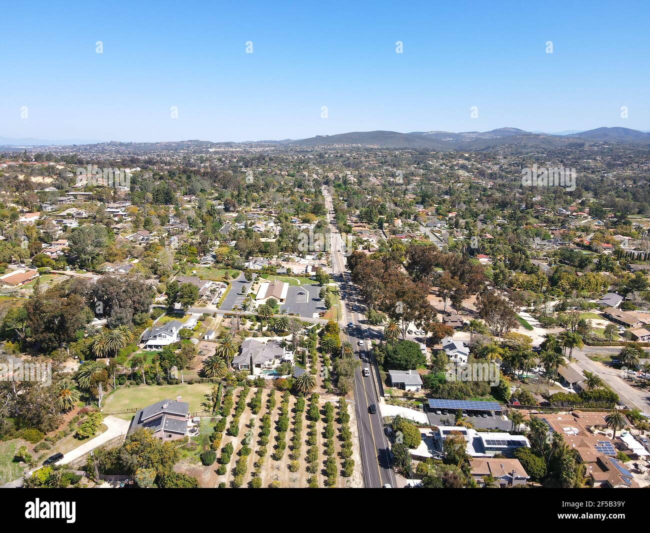 Aerial view of Rancho Santa Fe neighborhood with big mansions with pool ...
