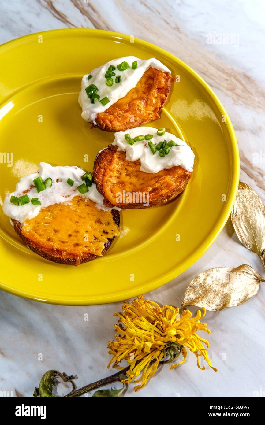 Oven roasted potato rounds hi-res stock photography and images - Alamy