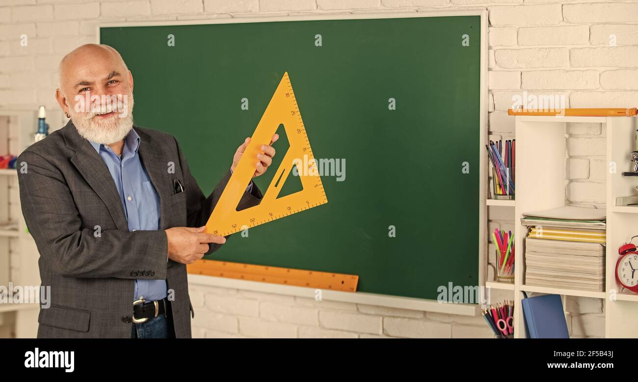 More Practice. bearded tutor man at blackboard. back to school. Math ...