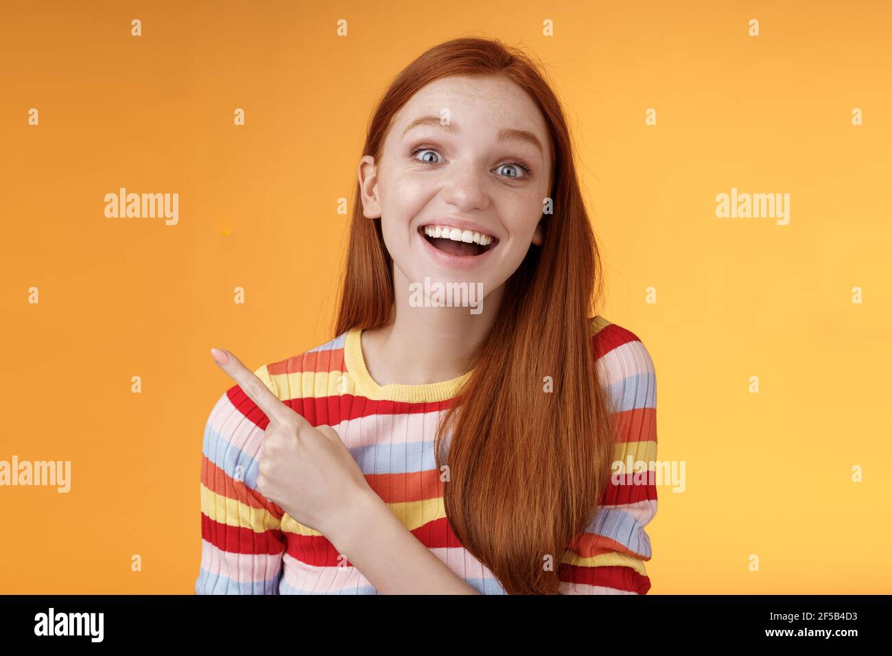 Amused carefree thrilled emotional redhead female fan adore talking ...
