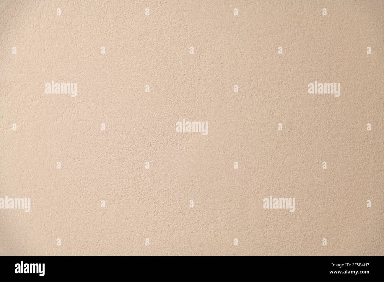 House wall with texture painted in beige Stock Photo - Alamy