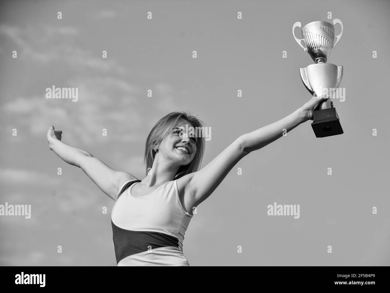 Woman athlete celebrate Black and White Stock Photos & Images - Alamy