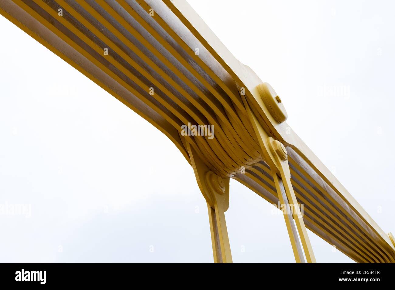 Detail of a joint in a self anchored suspension bridge painted bright ...