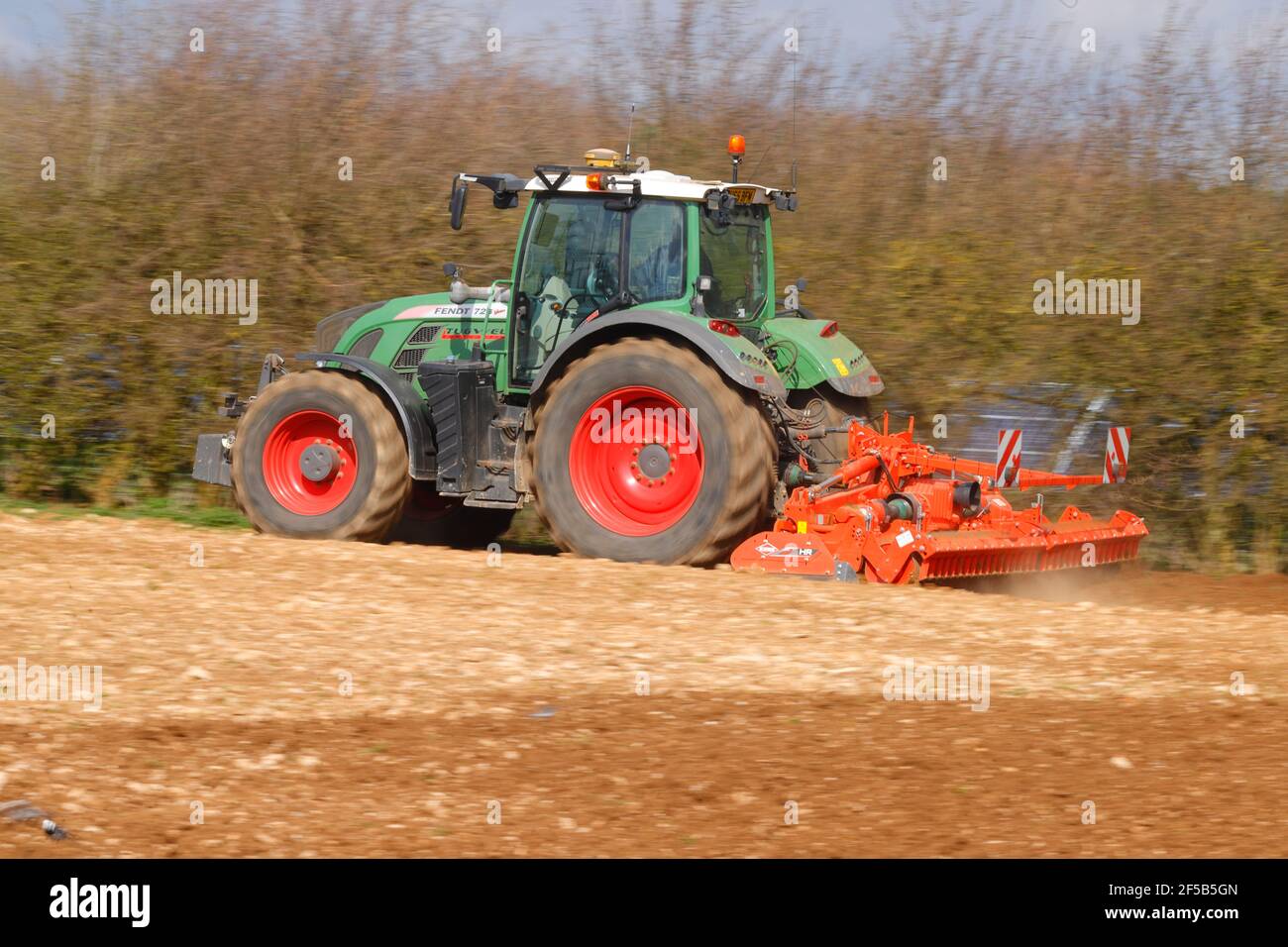 Tractor with red rear wheels hi-res stock photography and images - Alamy