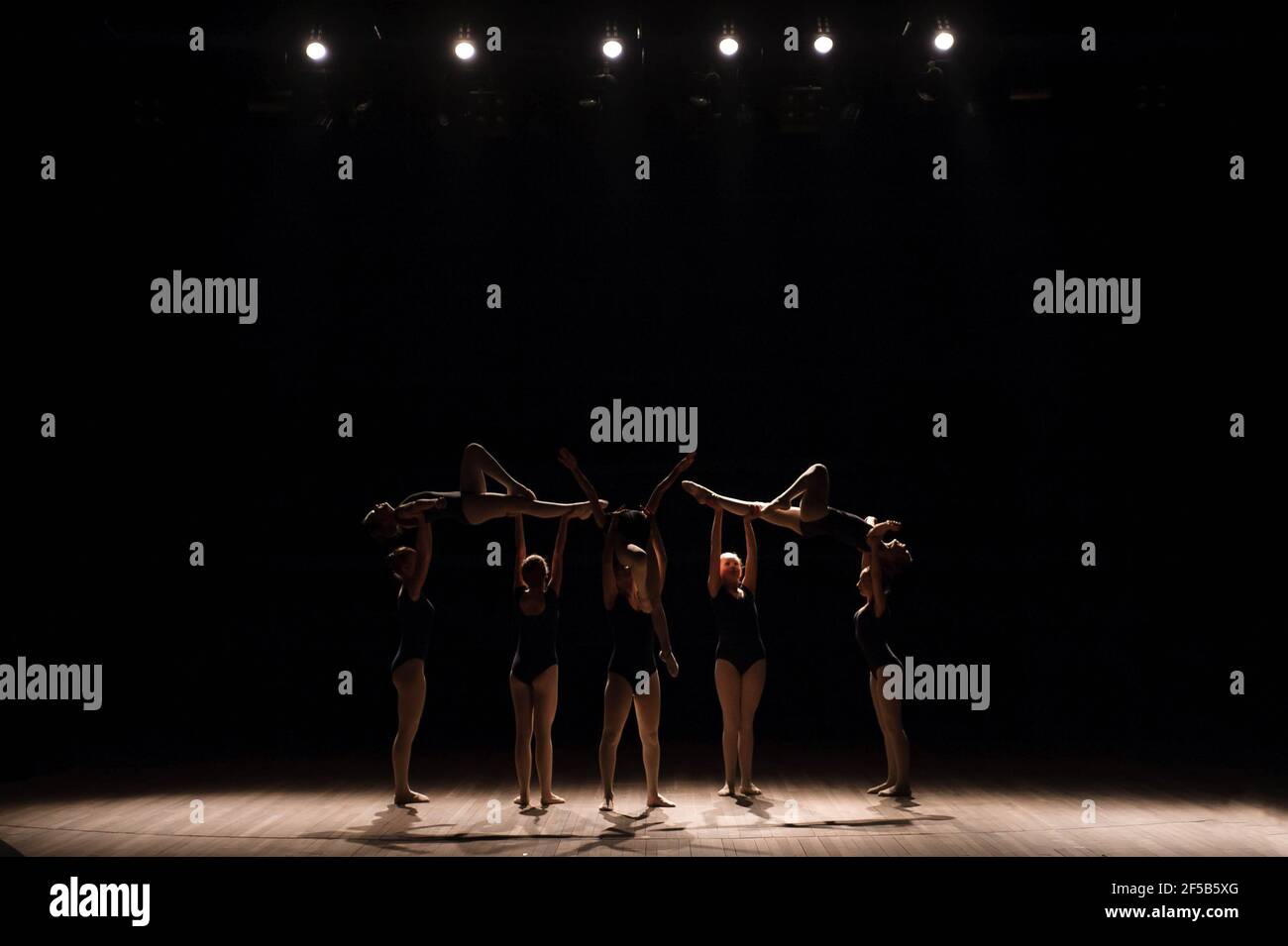 Acrobatic dance. Dance with elements of acrobatics. Girls doing dance ...