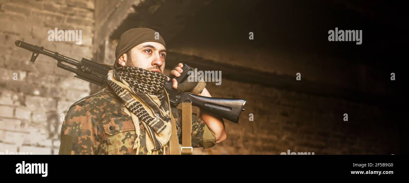 The Arab soldier with the AK-47 Kalashnikov assault rifle Stock Photo ...