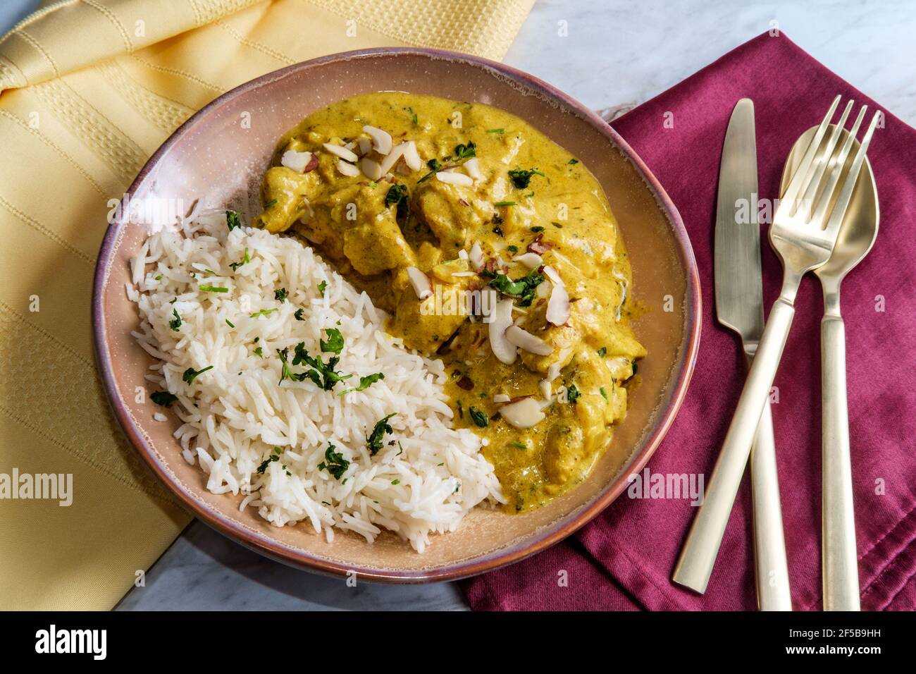 Authentic Indian chicken korma curry with jasmine rice Stock Photo - Alamy