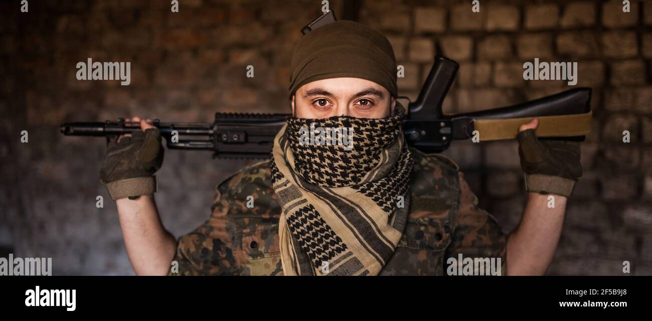 Arab male soldier in a headdress from the national keffiyeh with ...