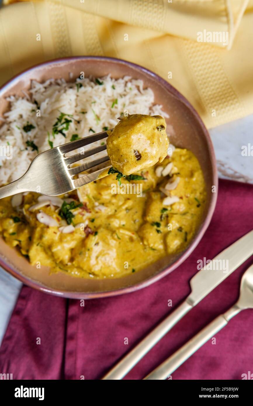 Authentic Indian chicken korma curry with jasmine rice Stock Photo - Alamy