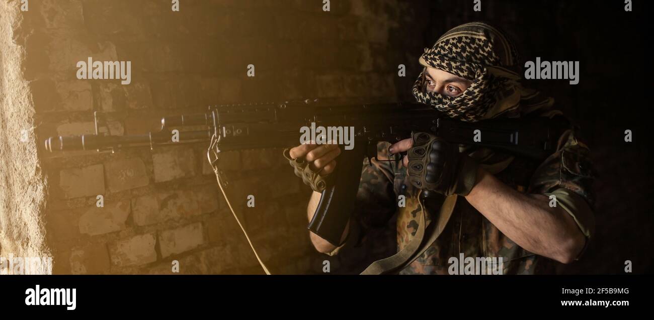 Arab soldier aiming with Kalashnikov AK-47 assault rifle Stock Photo ...