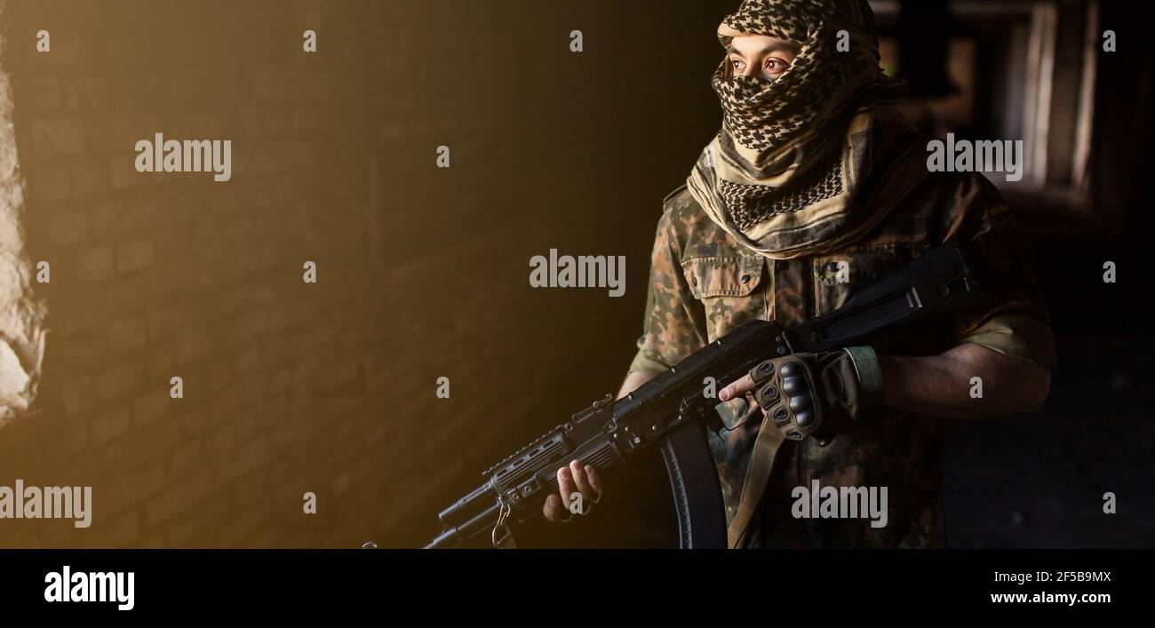 The Arab soldier with the AK-47 Kalashnikov assault rifle Stock Photo ...