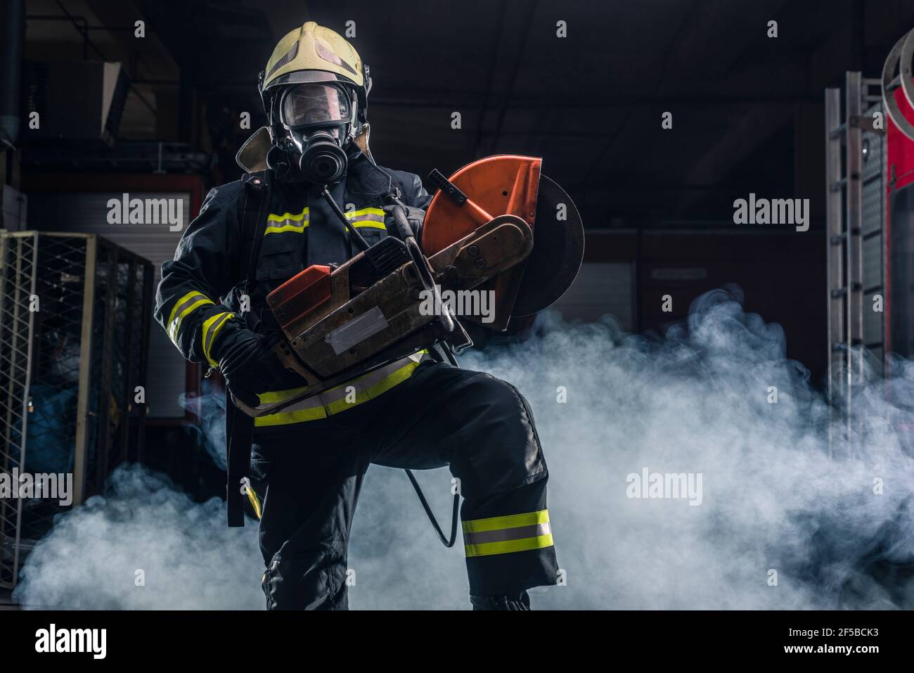 Chainsaw on blue background hi-res stock photography and images - Alamy