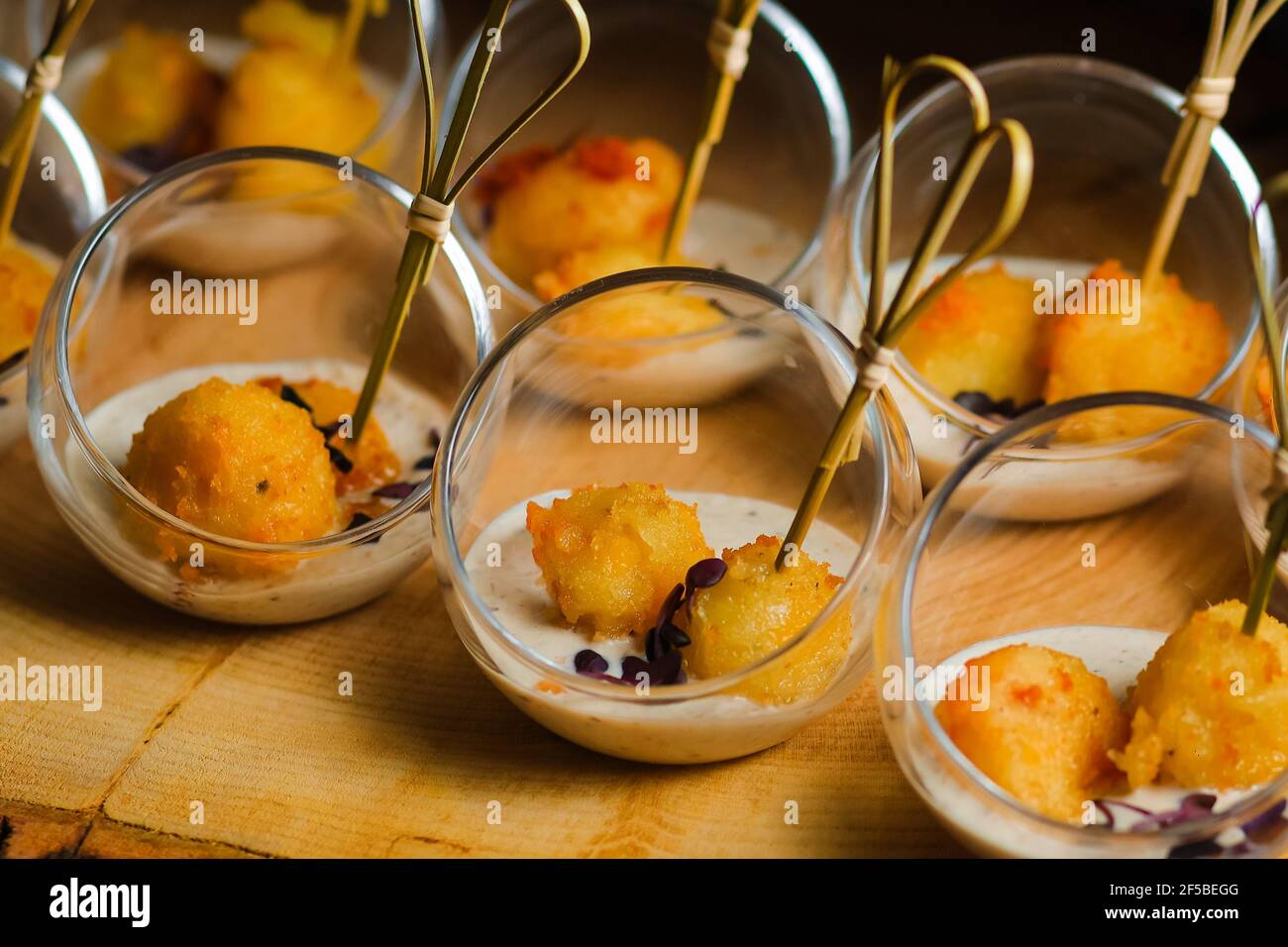 Catering service. Table with snacks food at event Stock Photo - Alamy