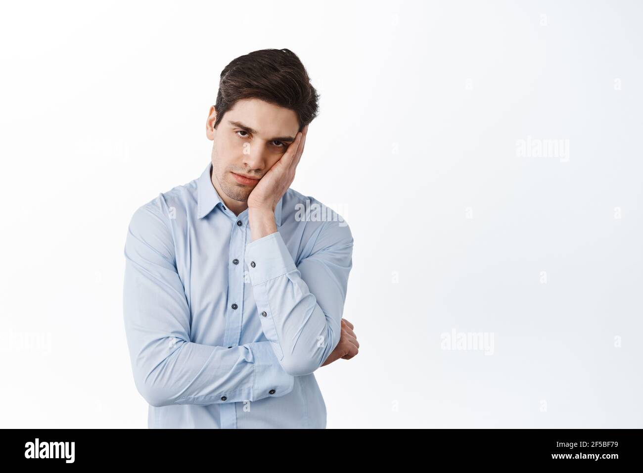 Tired grumpy office worker, looking with angry distressed face and dark ...