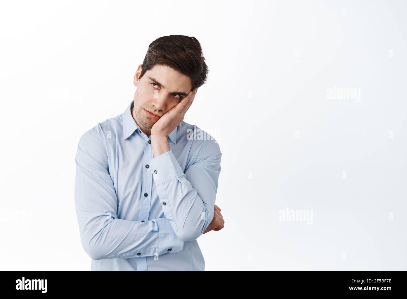 Annoyed office worker look aside with angry irritated face, lean on ...