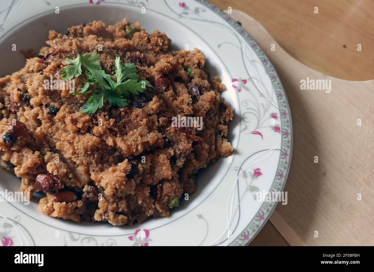 Close up shot of Dalia upma or broken wheat upma, South Indian ...
