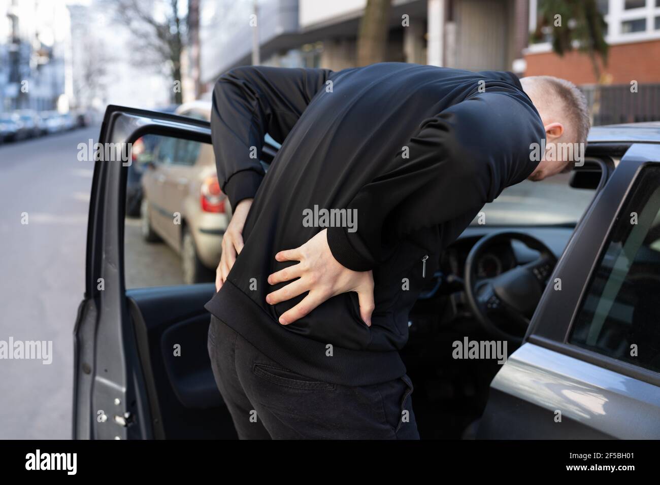 Car Driver Back Pain Injury. Bad Posture Stock Photo - Alamy