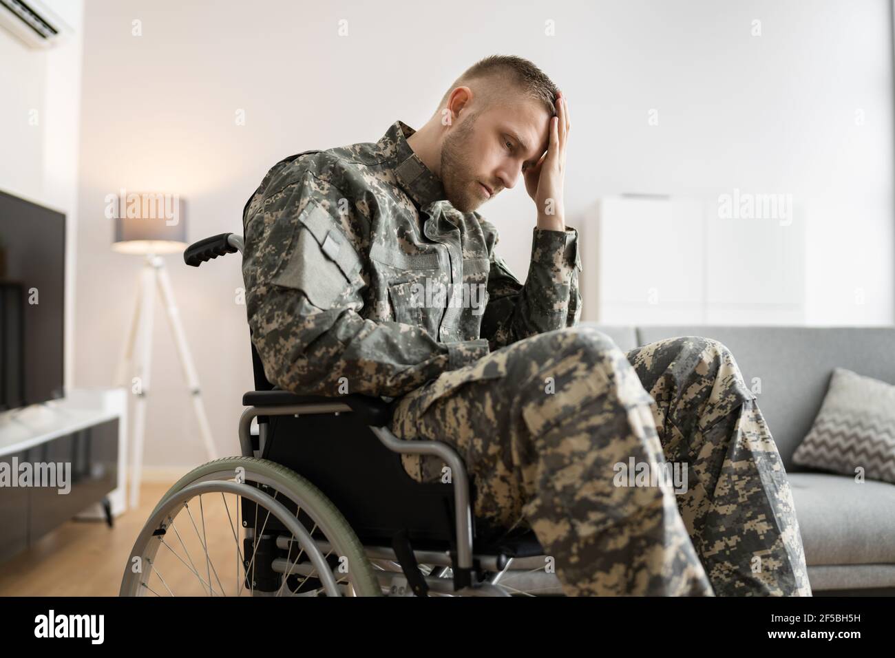 Disabled Military Soldier In Wheelchair With PTSD After Injury And ...