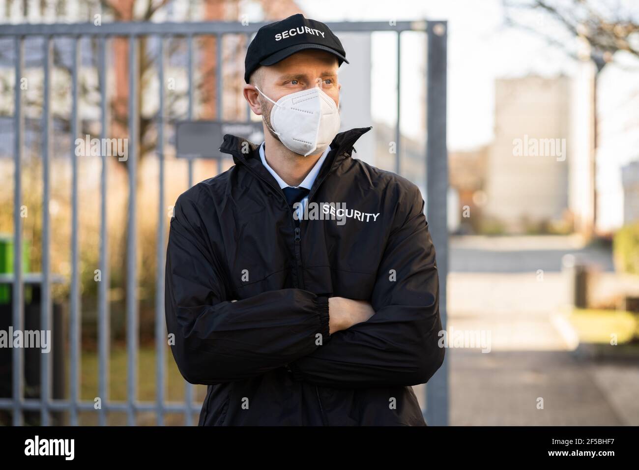 Security guard wearing face mask hi-res stock photography and images ...