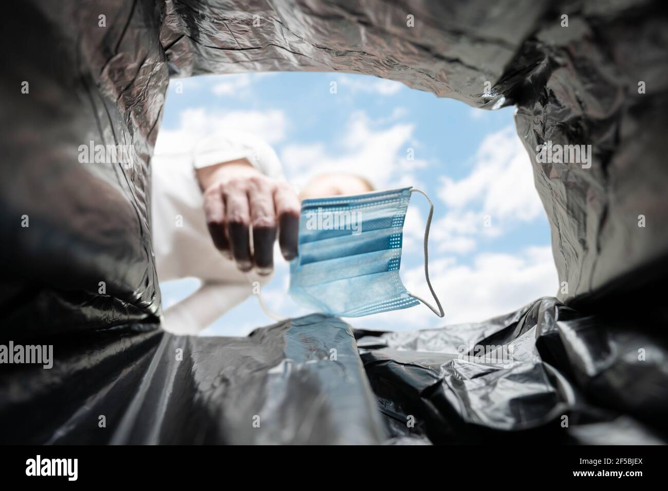 Bin mask medical waste disposal hi-res stock photography and images - Alamy