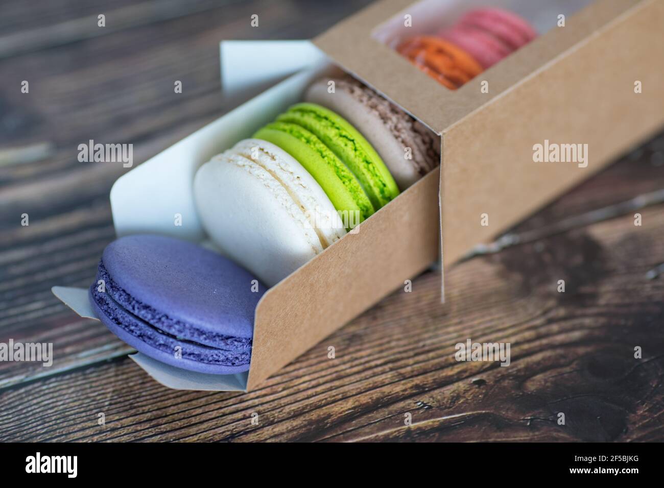 Close up macaroon in paper hi-res stock photography and images - Alamy