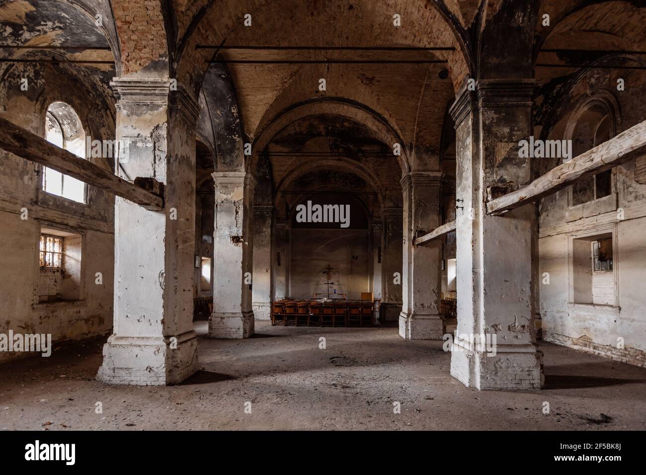 Interior of dark creepy abandoned lutheran church of the Virgin Mary ...