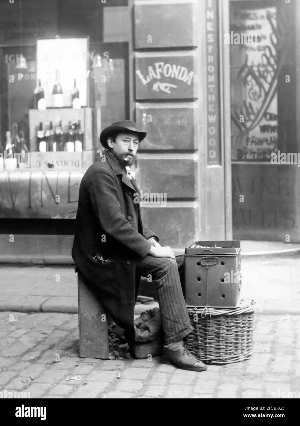A roast chestnut seller, Victorian period Stock Photo - Alamy