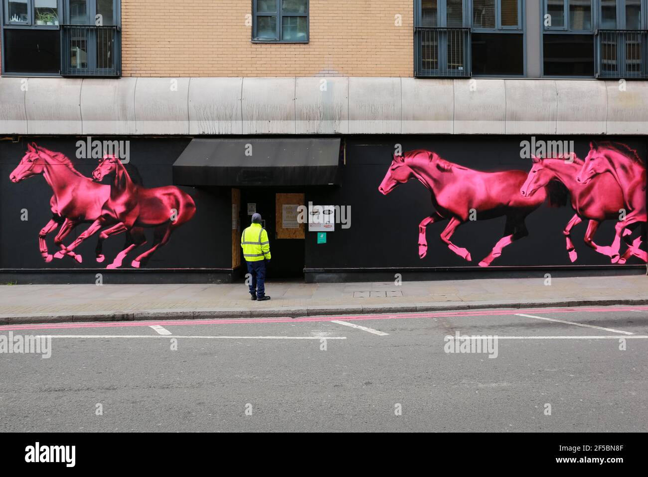 London, UK. 25 March 2021. Street Art London in Shoreditch. Neon style ...