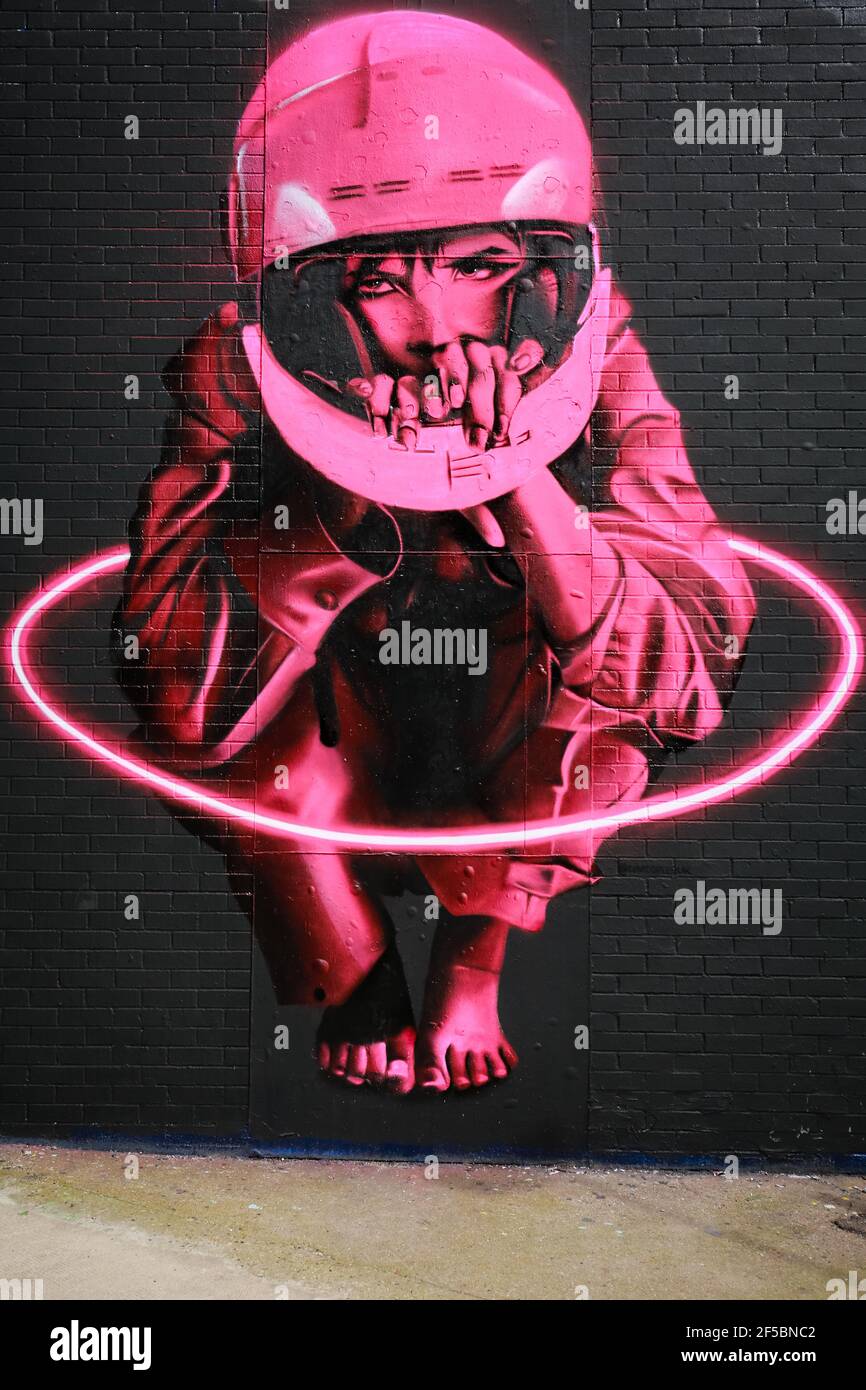 London, UK. 25 March 2021. Street Art London in Shoreditch. Neon style ...