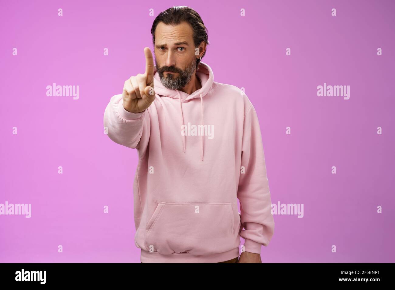 One rule listen. Serious-looking bossy focused determined adult bearded ...