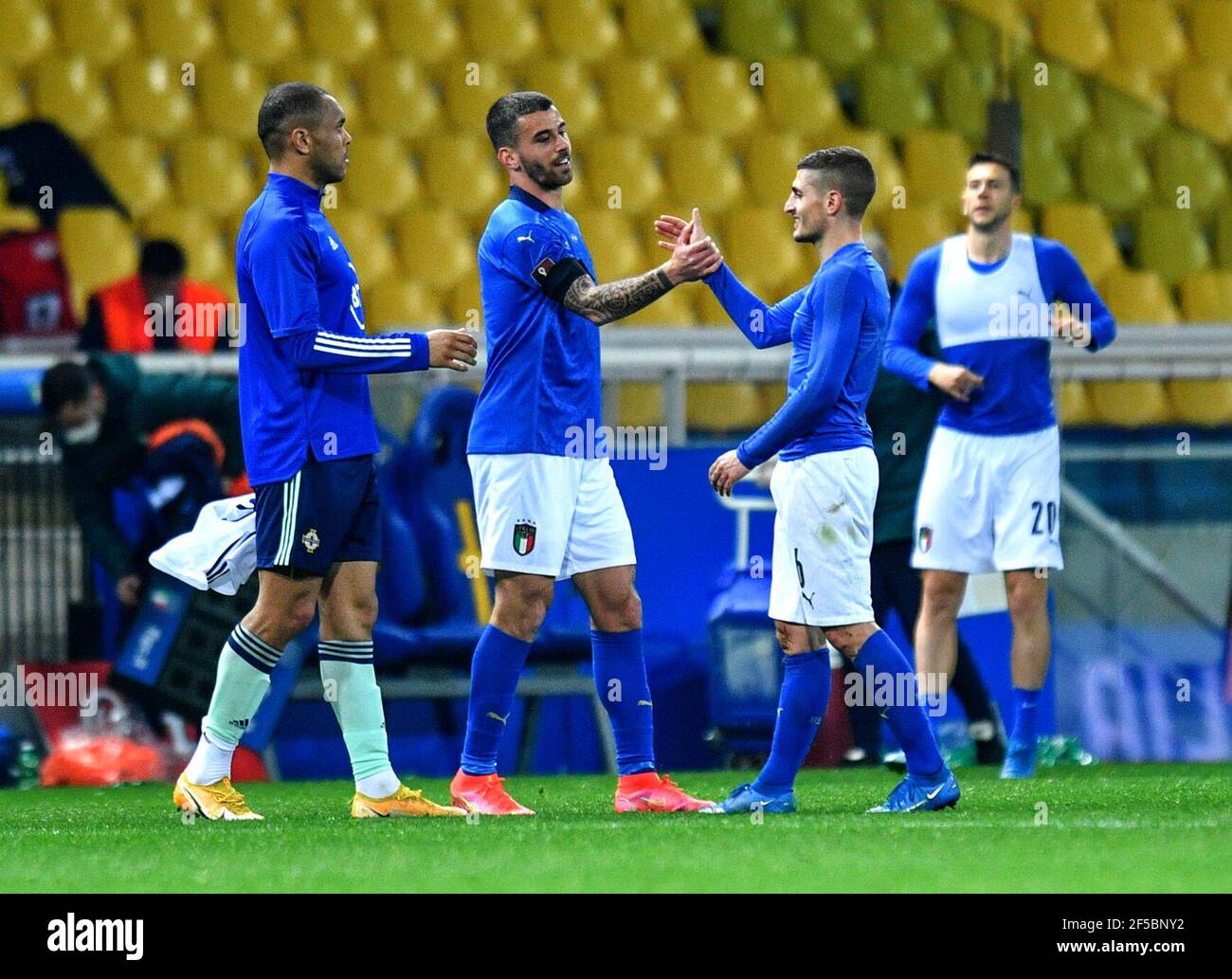 Italy's Marco Verratti (right) celebrates with a team-mate at the end ...
