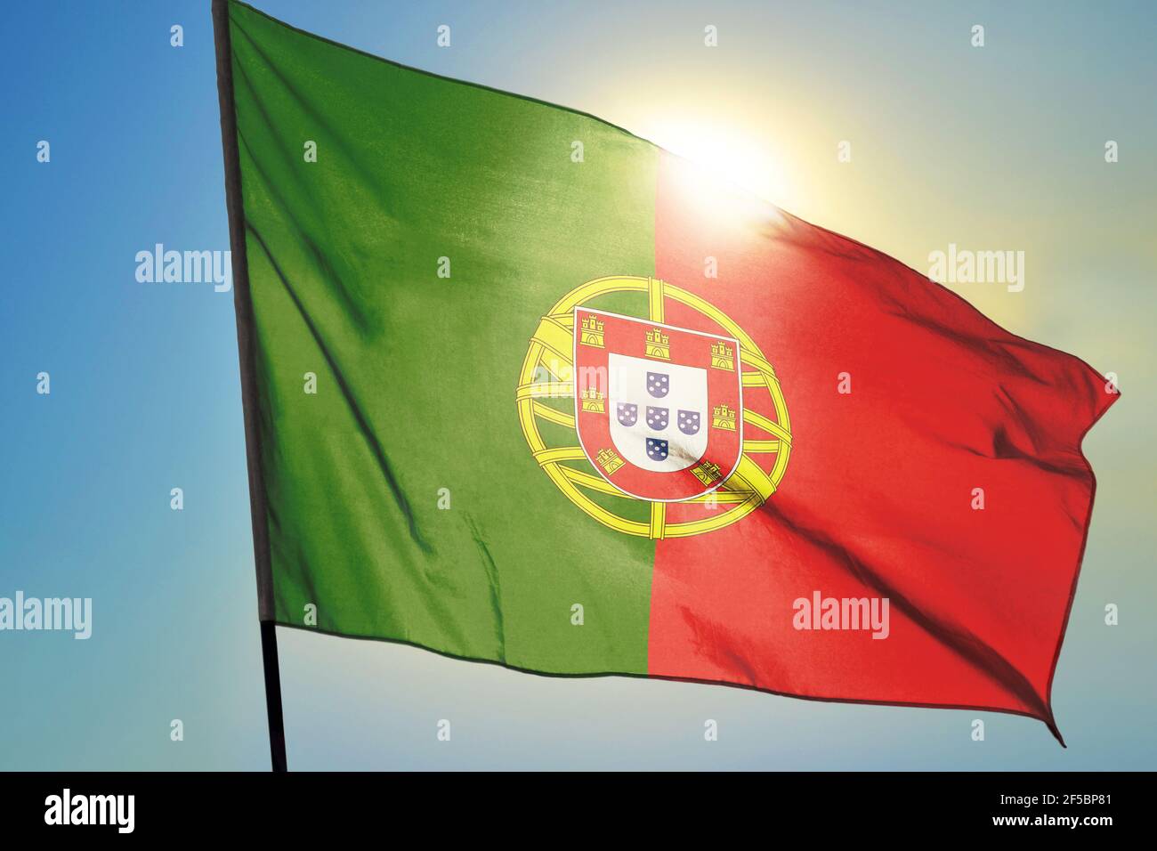 National flag of portugal waving hi-res stock photography and images ...