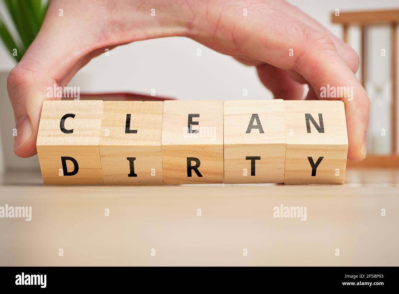 Choosing concept antonyms clean and dirty on wooden cubes Stock Photo ...