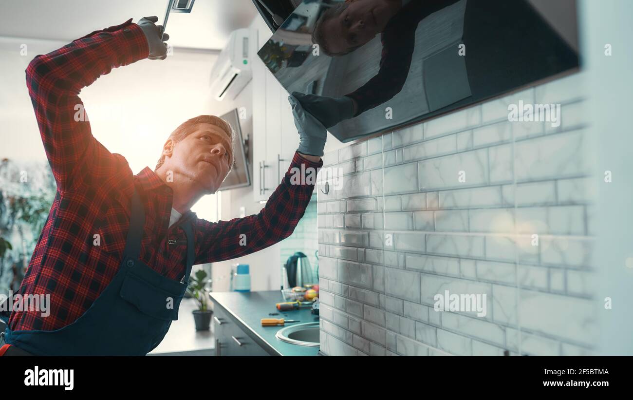 It needs fixing. Man solves household problems Stock Photo - Alamy