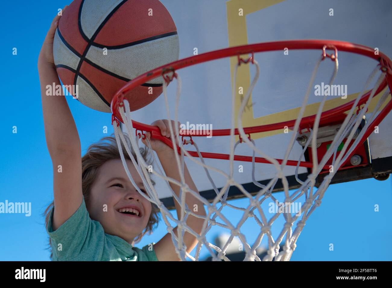 Child scoring goal hi-res stock photography and images - Alamy