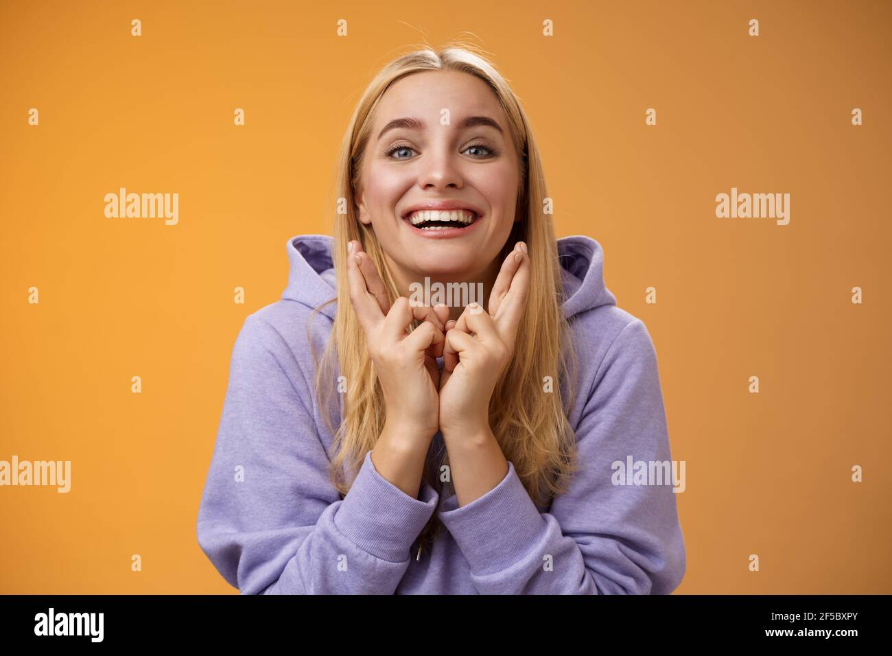 Lucky optimistic cute positive smiling blond girl grinning excited ...