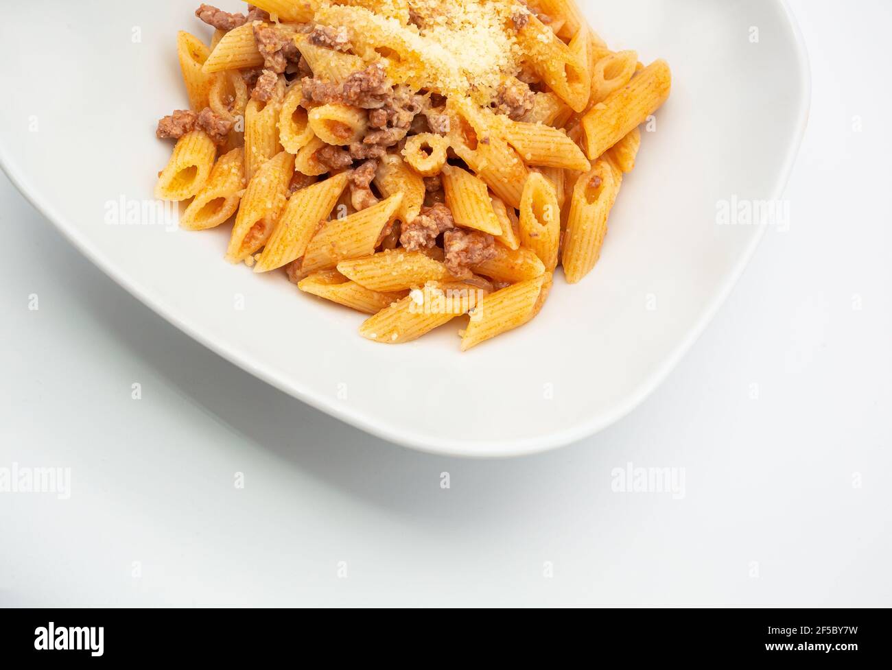 Homemade dish of delicious italian penne pasta with slowcooked ...