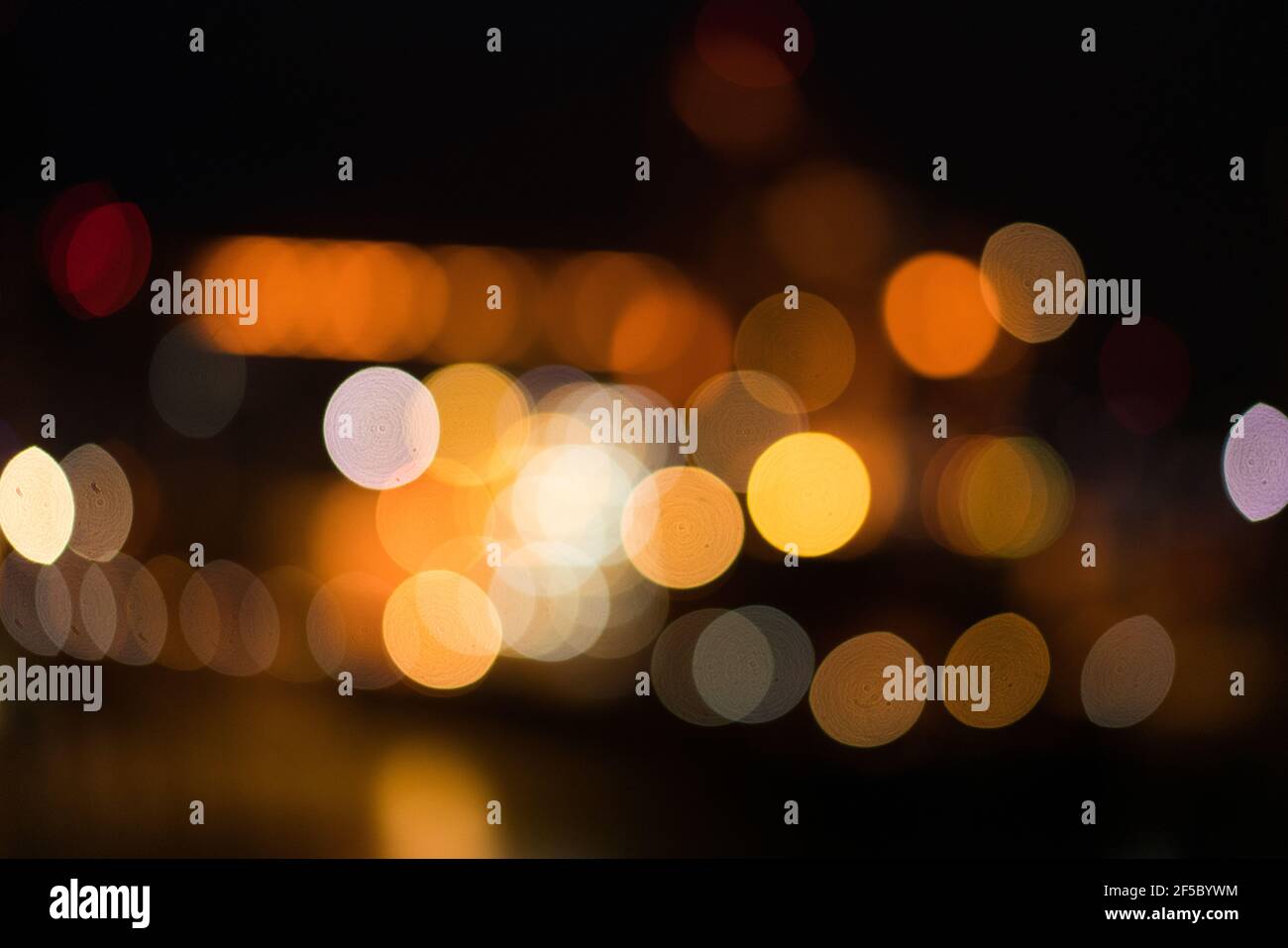 Colorful harbor lights out of focus create an interesting abstract ...