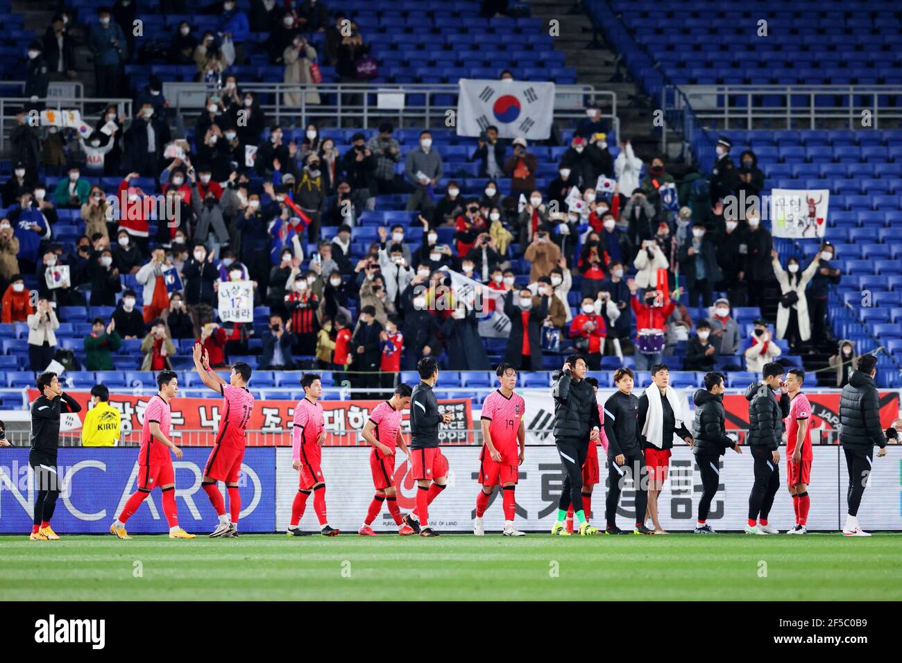Kanagawa, Japan. 25th Mar, 2021. (Top-Bottom) South Korea fans, South ...