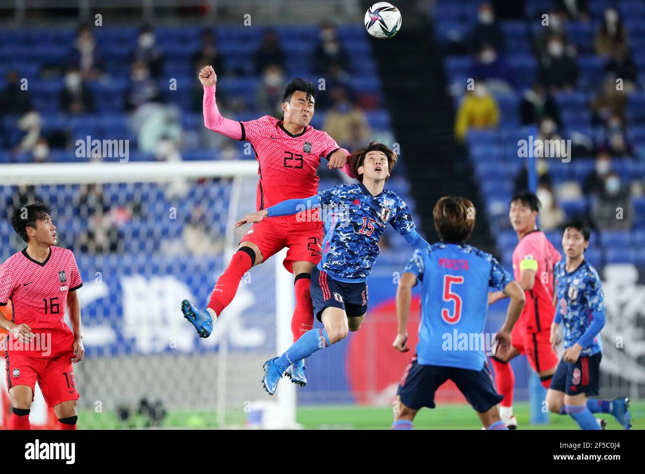 Kanagawa, Japan. 25th Mar, 2021. (L-R) Park Jisu (KOR), Yuya Osako (JPN ...