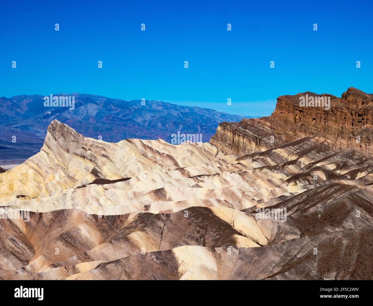 The stunning scenery of the badlands region near Zabriskie point in ...
