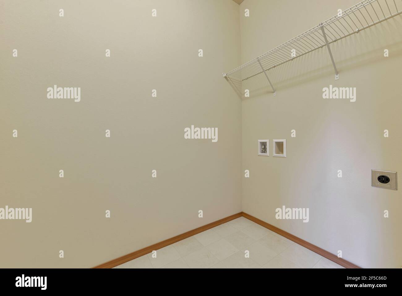 Empty residential laundry room interior Stock Photo - Alamy