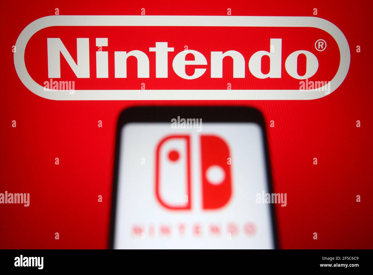 In this photo illustration the Nintendo logo of a Japanese consumer ...
