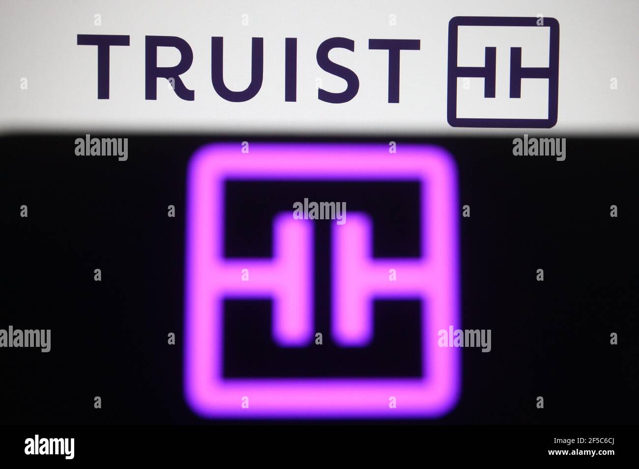 In this photo illustration the Truist financial corporation logo is ...