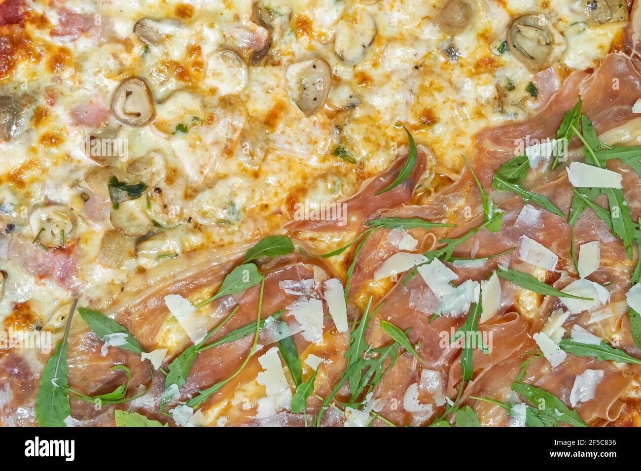 Close up Two Flavors Italian Pizza on Table for Background Stock Photo ...