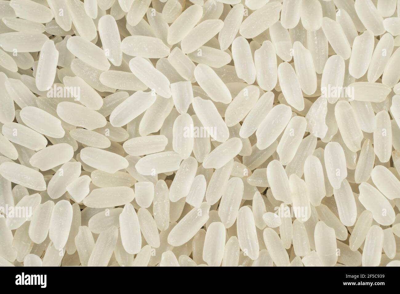 White rice texture background. Heap of white rice background. macro ...