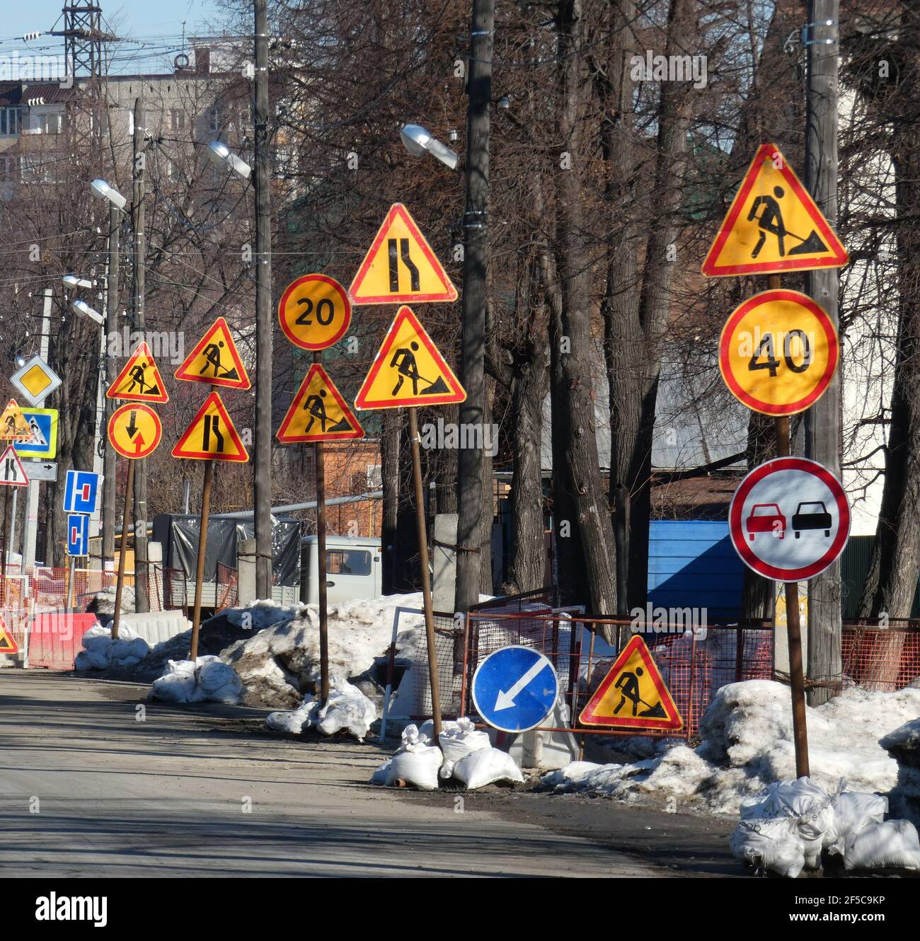 Under construction - Road signs along street Stock Photo - Alamy