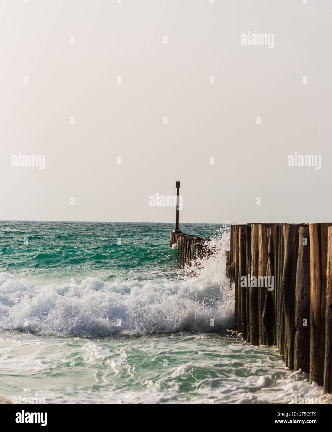 Waves on windy day at the beach Stock Photo - Alamy